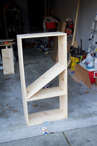 DIY Bookcase with Angled Shelves - BREPURPOSED